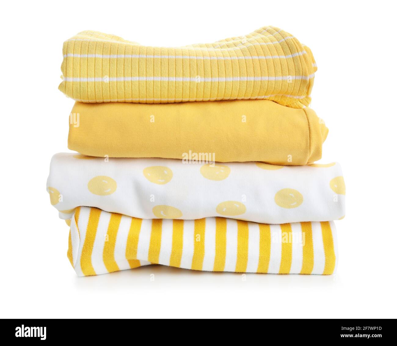 Stack of stylish clothes on white background Stock Photo - Alamy