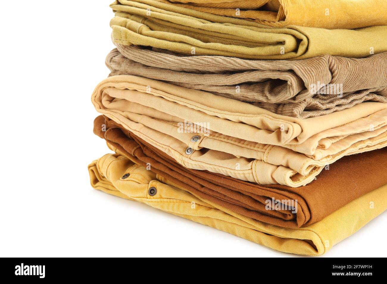 Stack of stylish clothes on white background Stock Photo - Alamy