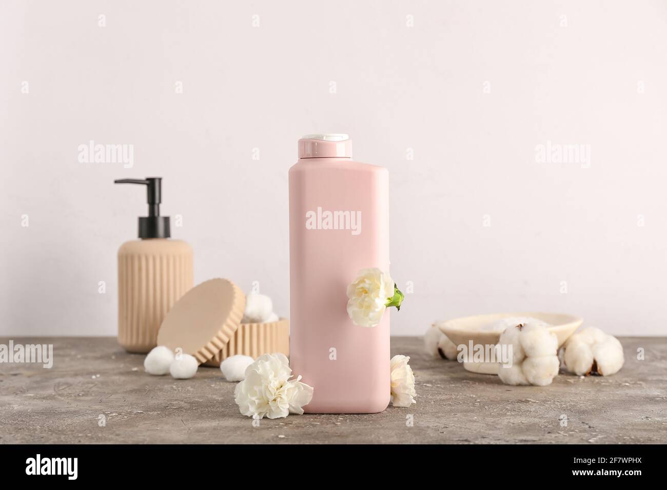 Composition with shower gels on light background Stock Photo - Alamy