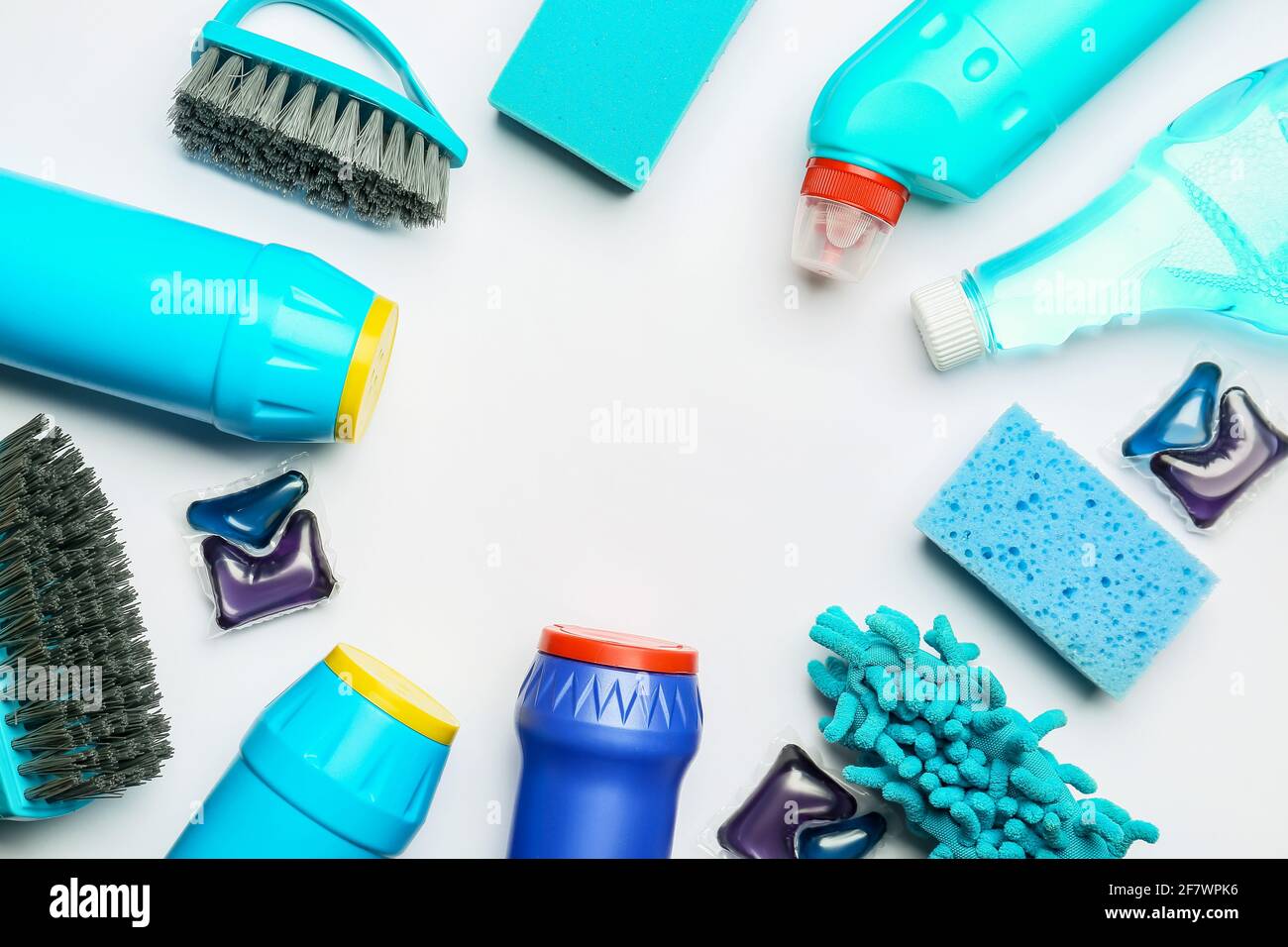 Frame made of cleaning supplies on white background Stock Photo - Alamy