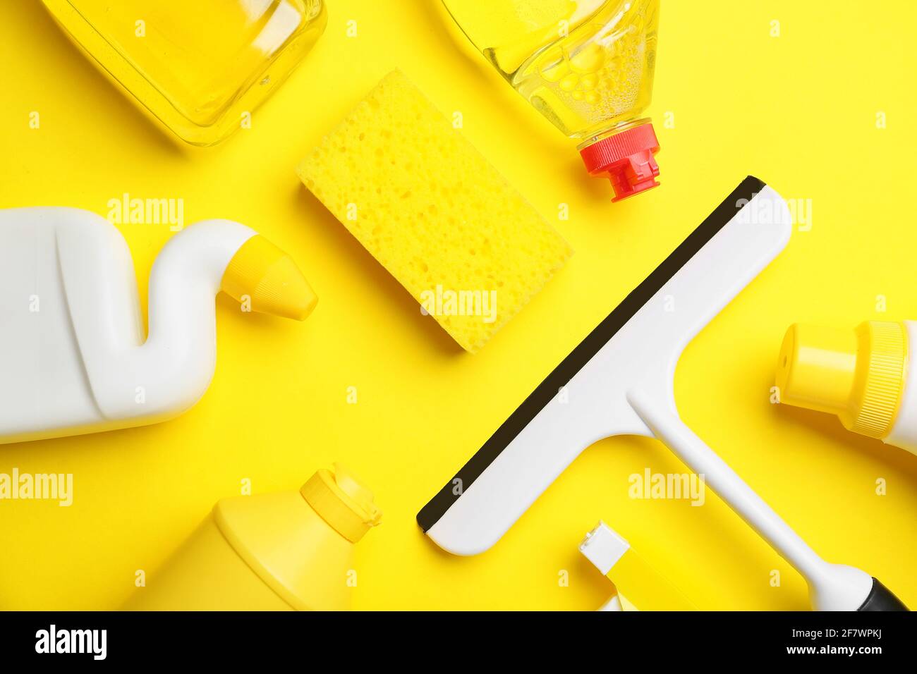 Set of cleaning supplies on color background Stock Photo - Alamy