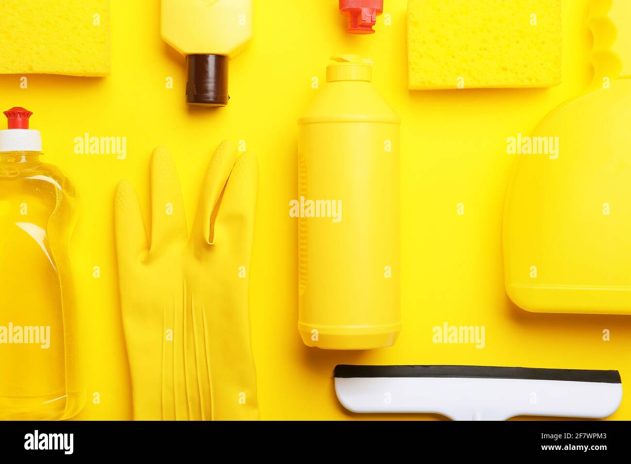 Set of cleaning supplies on color background Stock Photo - Alamy