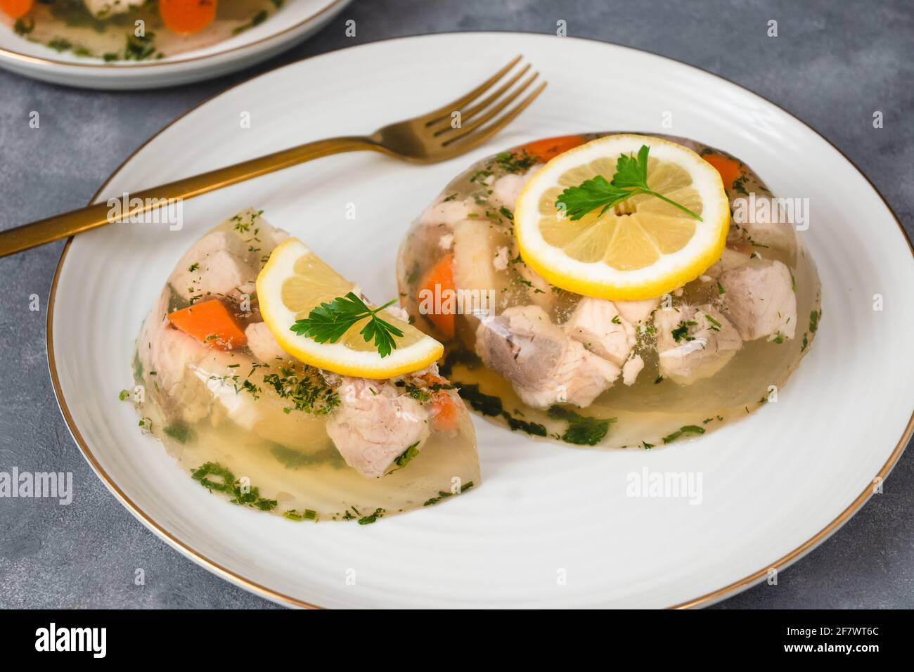 Fish in aspic with vegetables. Fish in jelly. Fish with gelatin Stock ...