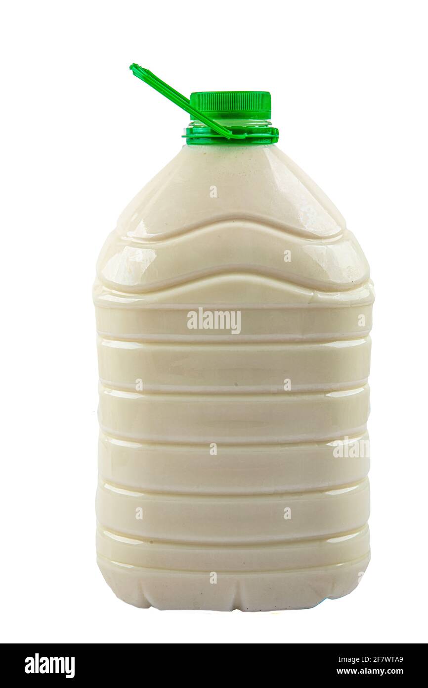 Daily milk. Milk plastic bottle isolated on white Stock Photo - Alamy