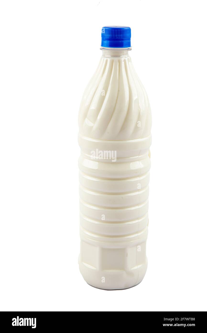 Daily milk. Milk plastic bottle isolated on white Stock Photo - Alamy