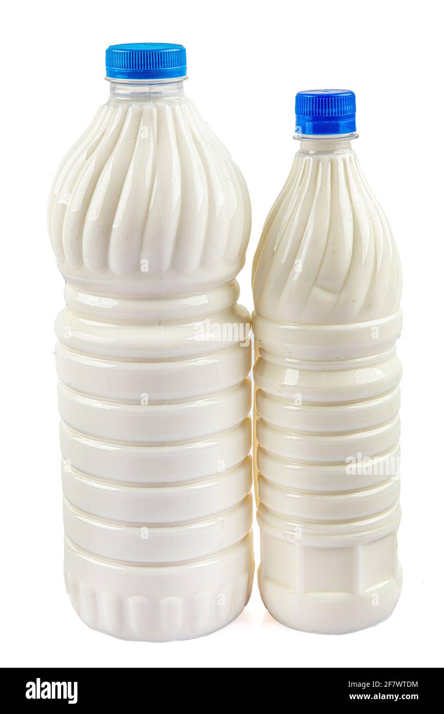 Daily milk. Milk plastic bottle isolated on white Stock Photo - Alamy