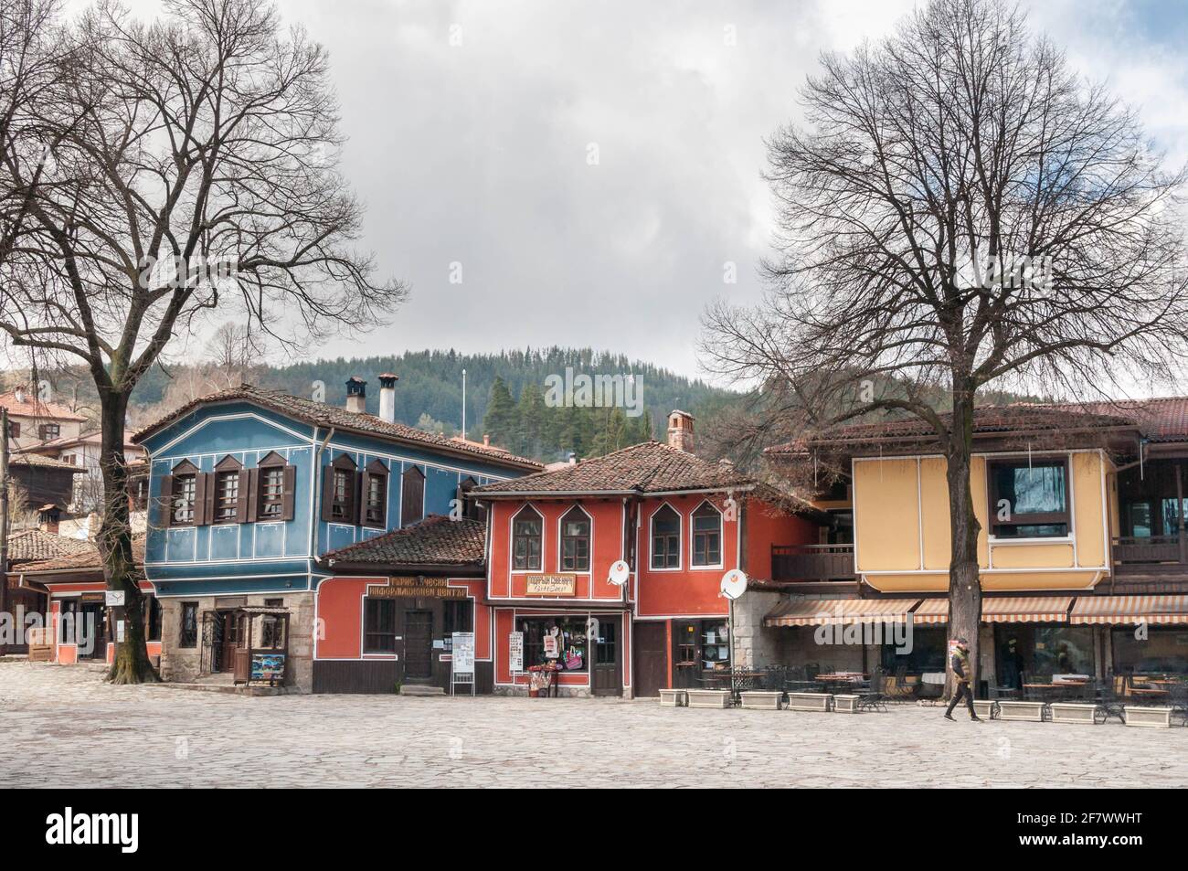 Colourful wooden houses in traditional Bulgarian architecture style in ...