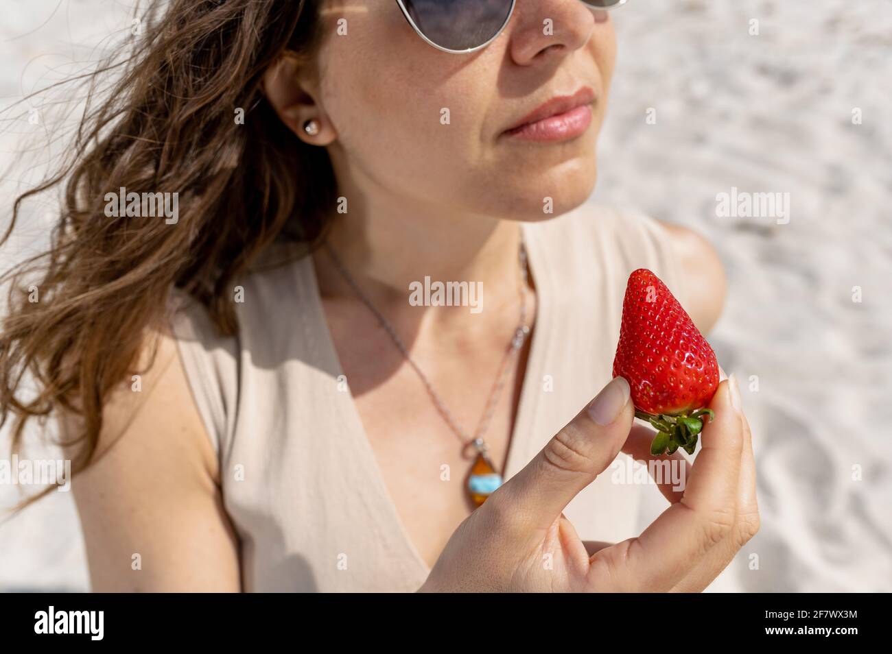 Woman mouth eating strawberry hi-res stock photography and images - Alamy
