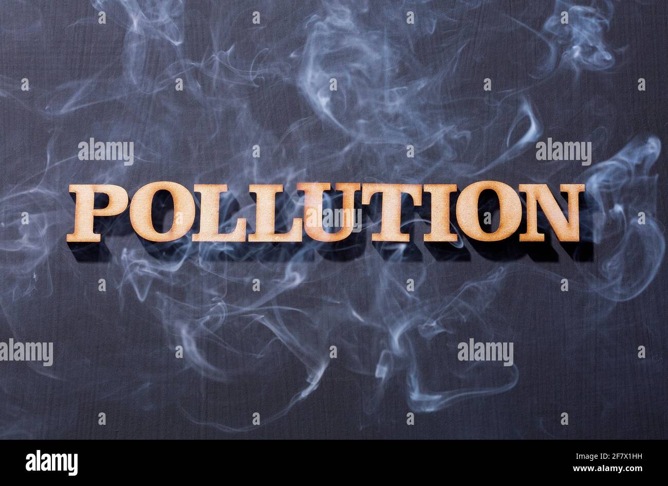 Word pollution in wooden letters with smoke Stock Photo - Alamy