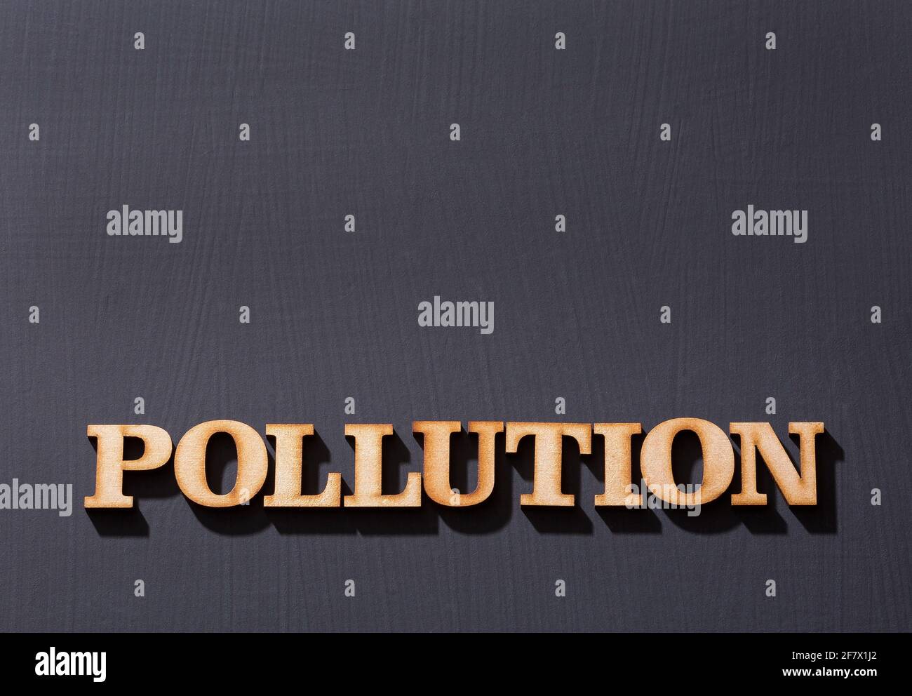 Word pollution in wooden letters. Top view Stock Photo - Alamy