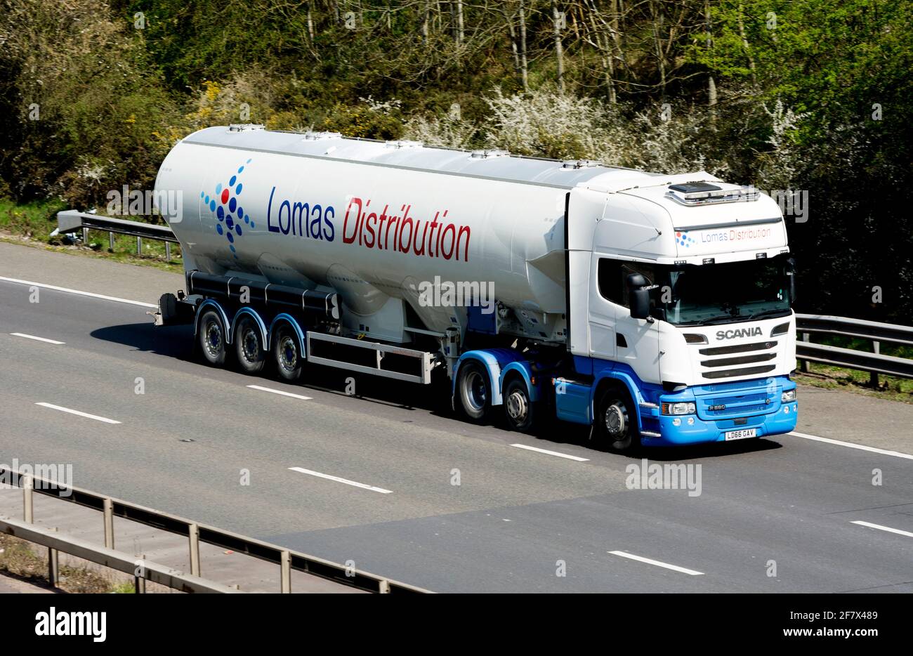 A Lomas Distribution tanker lorry on the M40 motorway, Warwickshire, UK ...