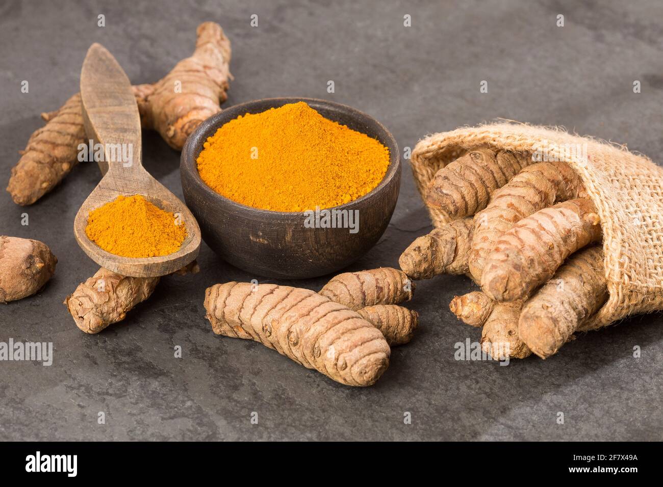 Fresh organic root and turmeric powder - Curcuma longa Stock Photo - Alamy