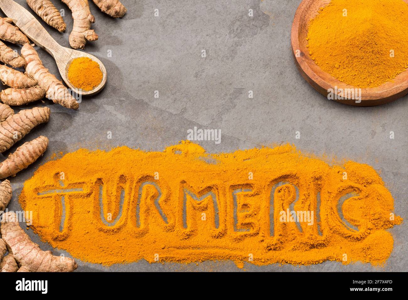 Fresh organic root and turmeric powder - Curcuma longa Stock Photo - Alamy