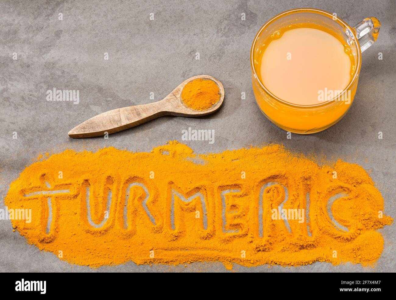 Turmeric and water, healthy drink - Space for text Stock Photo - Alamy