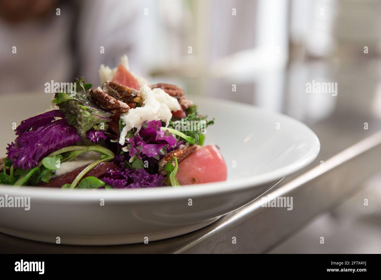 Fresh vegetarian salad with walnuts and cheese Stock Photo - Alamy