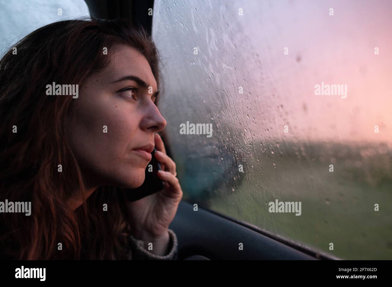 Car window rain girl hi-res stock photography and images - Alamy