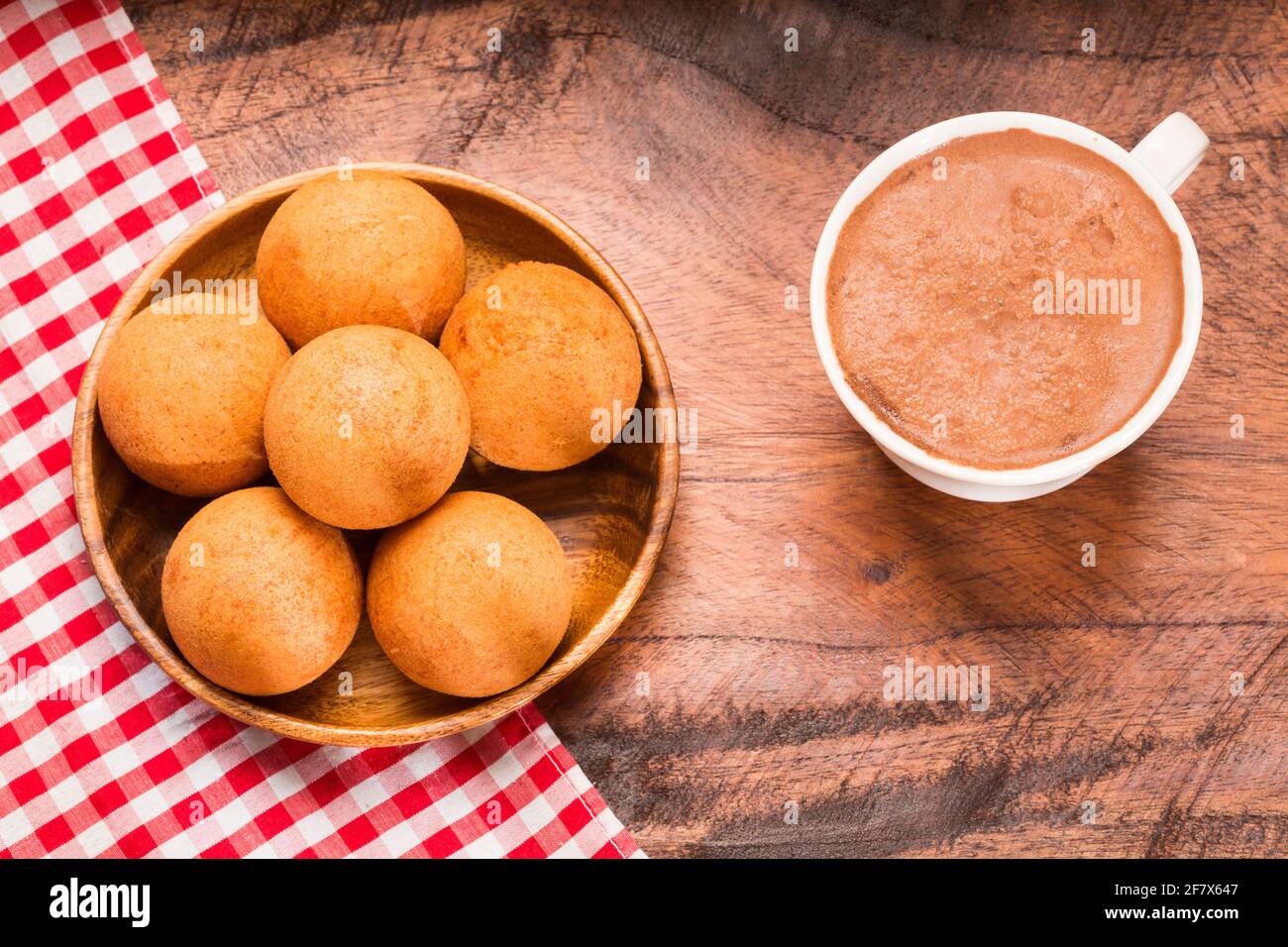 Traditional Colombian buñuelo - Deep Fried Cheese Bread. Hot chocolate ...