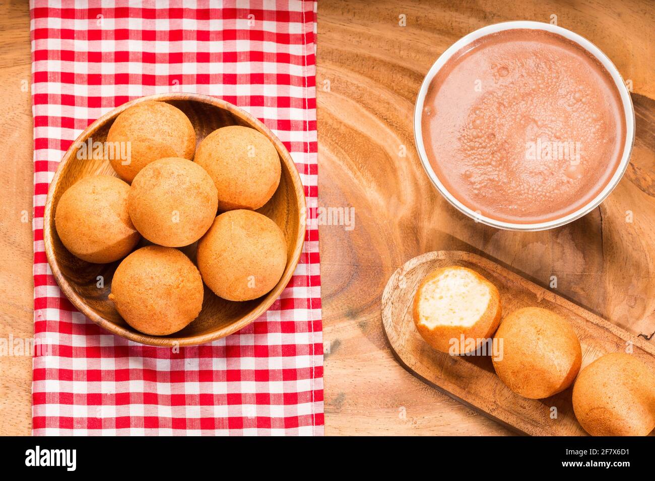 Traditional Colombian buñuelo - Deep Fried Cheese Bread. Hot chocolate ...