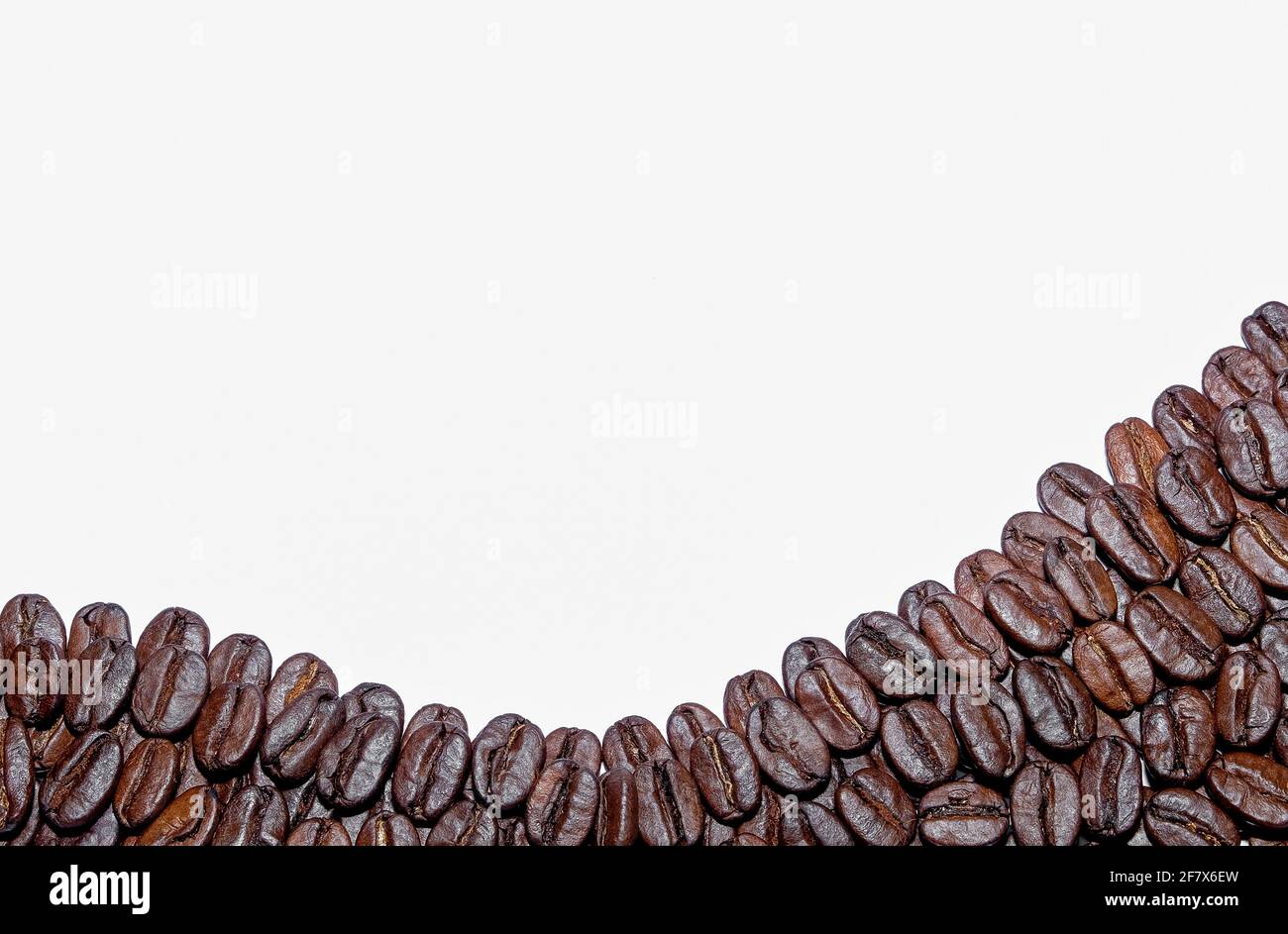 coffee in beans on a white background Stock Photo - Alamy