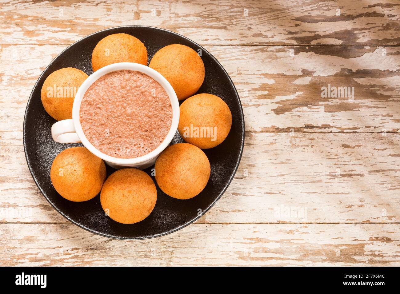Traditional Colombian buñuelo - Deep Fried Cheese Bread. Hot chocolate ...