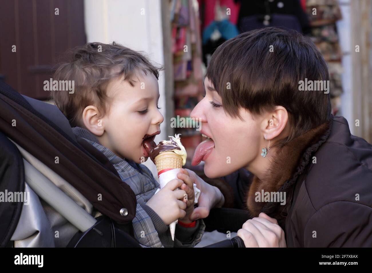 Woman licks ice cream hi-res stock photography and images - Alamy