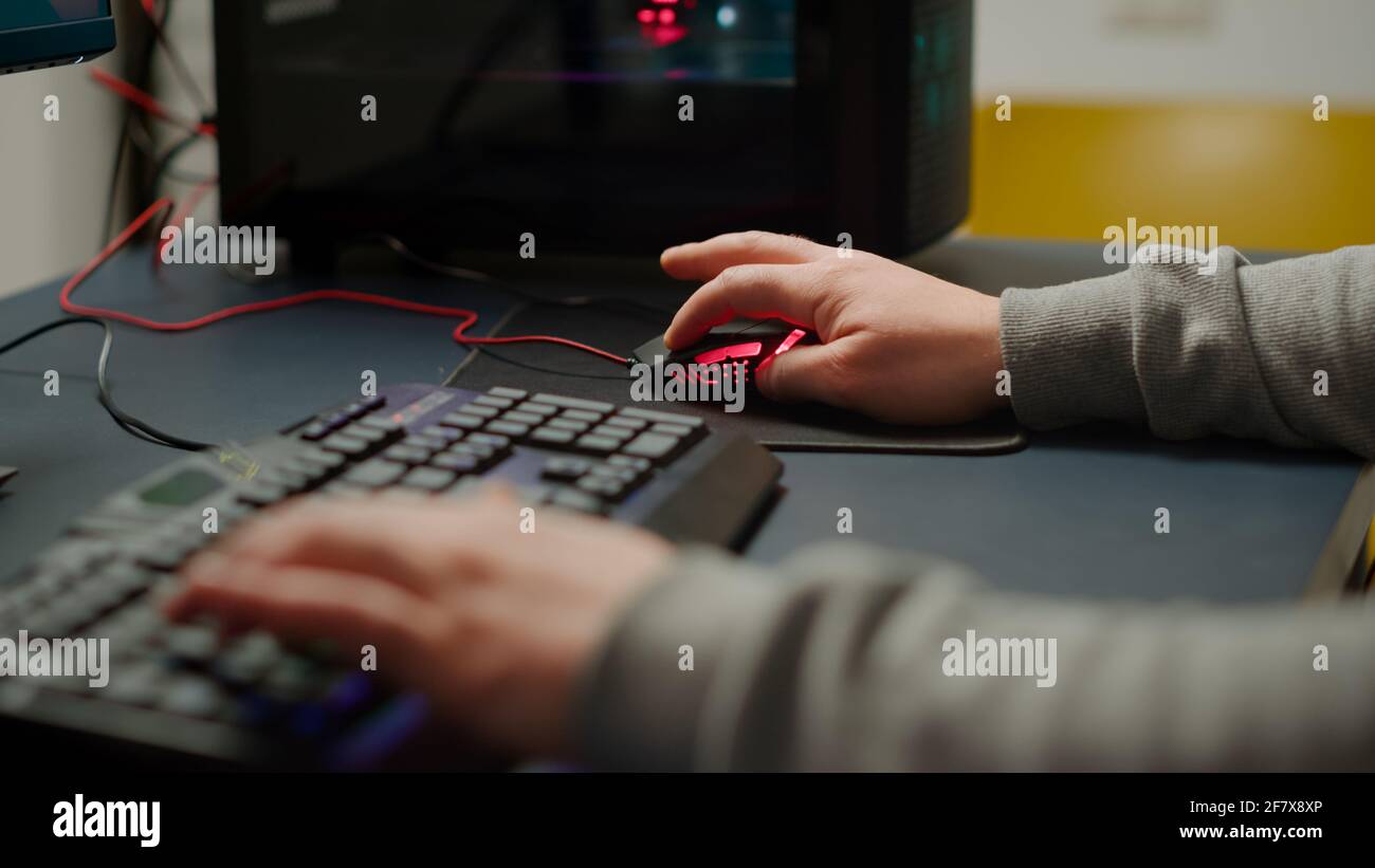 Hands typing on rgb keyboard hi-res stock photography and images - Alamy