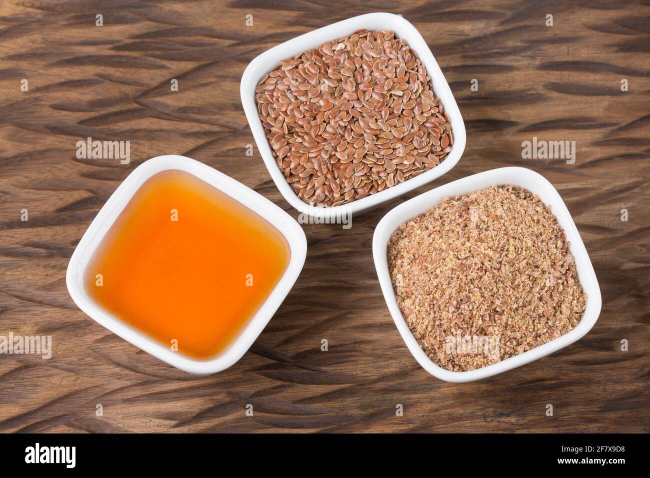 Linseed oil and flax seeds - Linum usitatissimum Stock Photo - Alamy