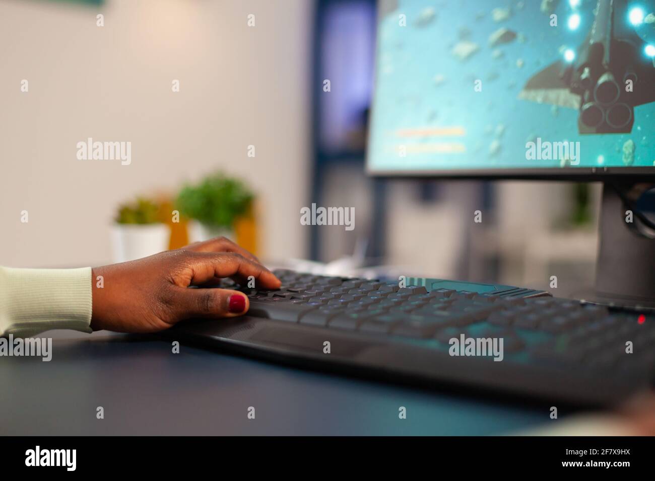 Black professional esports competitive gamer using game keyboard Close ...