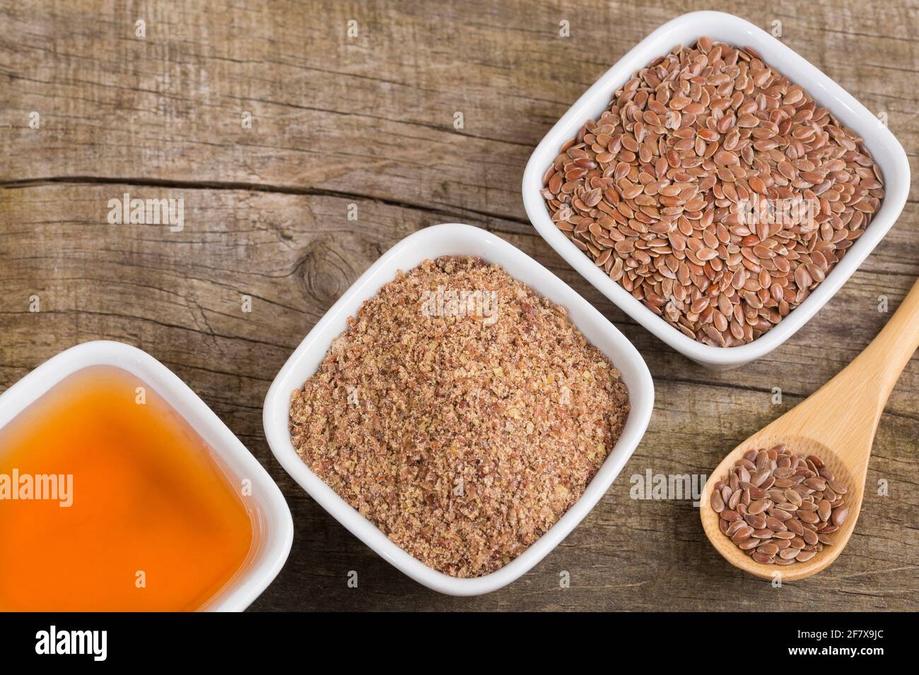 Linseed oil and flax seeds - Linum usitatissimum Stock Photo - Alamy