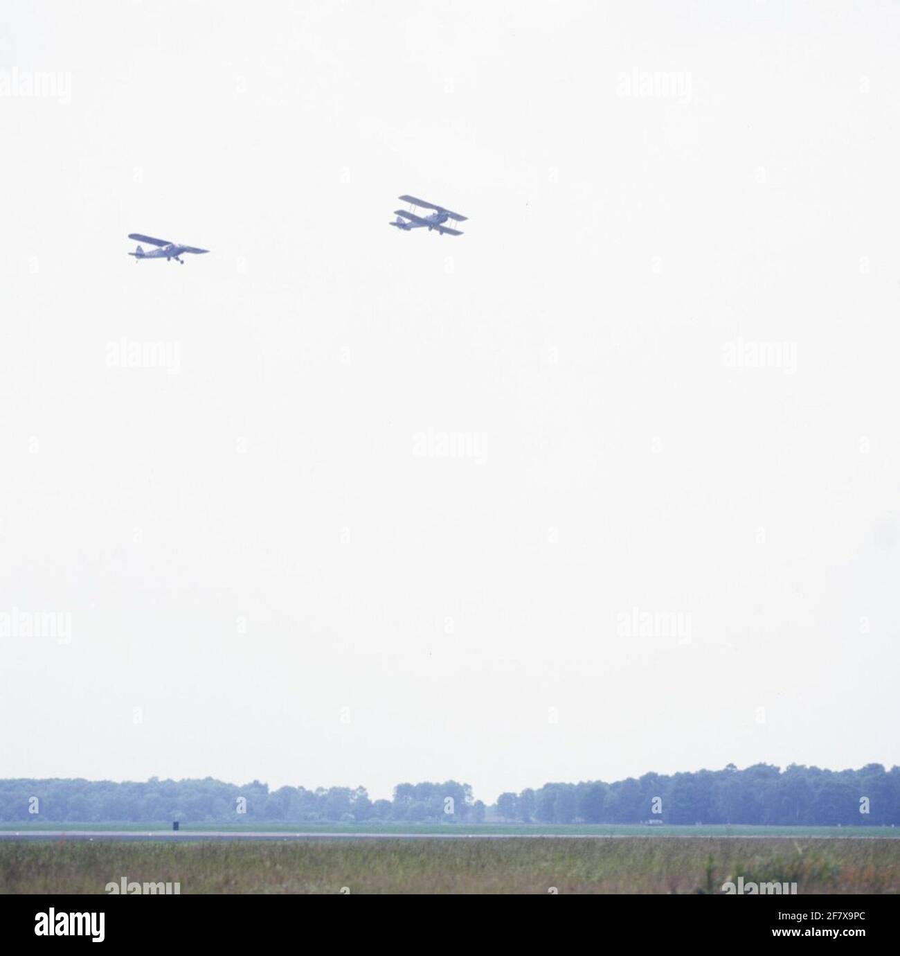 A Havilland DH-82A Tiger Moth and a Piper Super Cub from the Flight ...