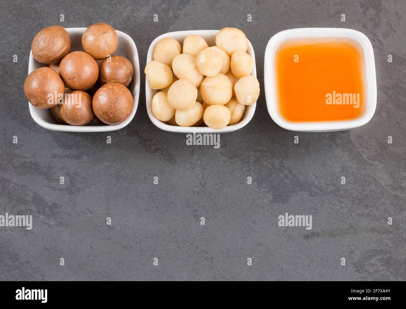 Oil and macadamia nuts - Macadamia integrifolia Stock Photo - Alamy