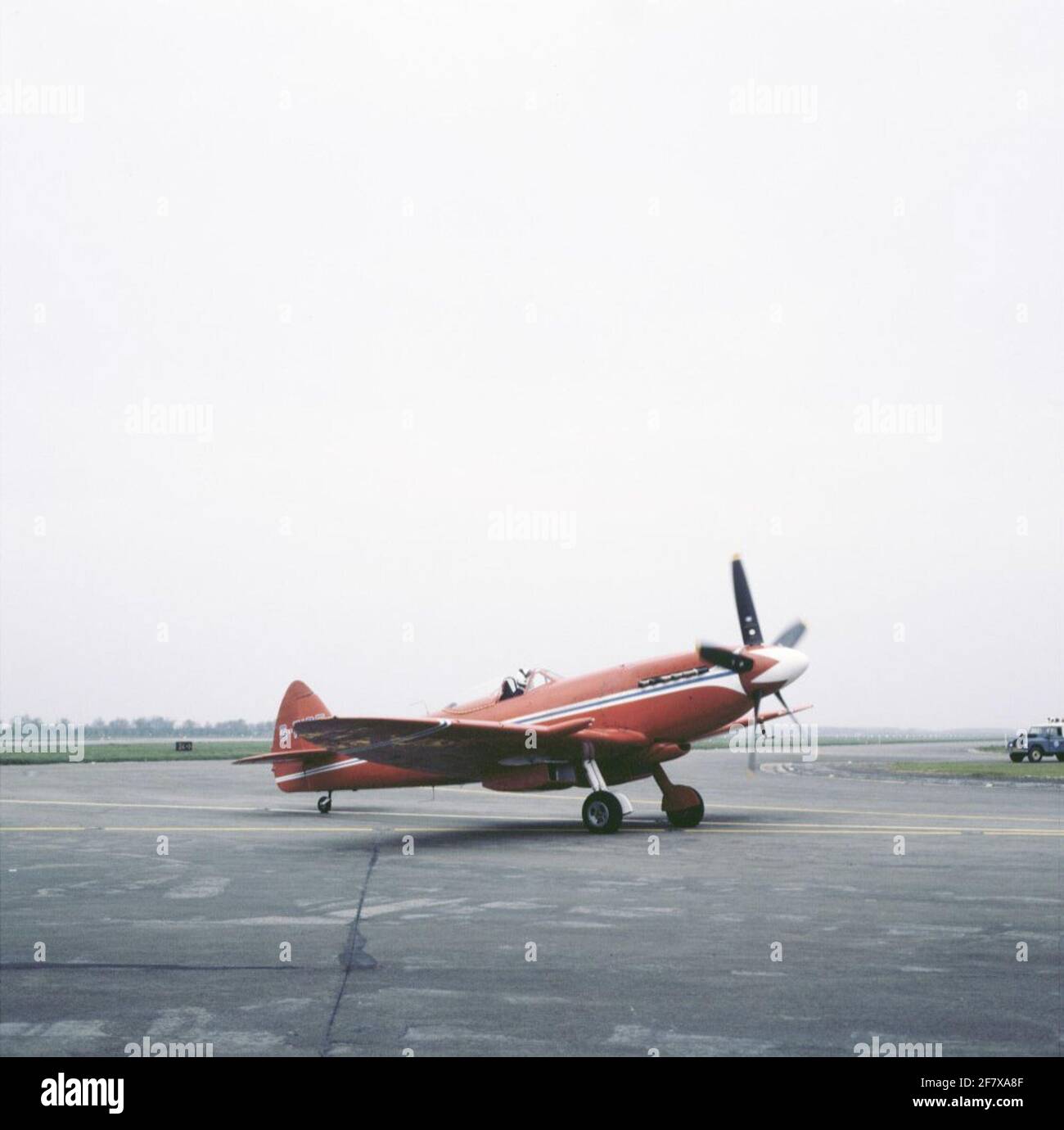 A supermarine Spitfire XIV in orange-red painting on the liberation ...