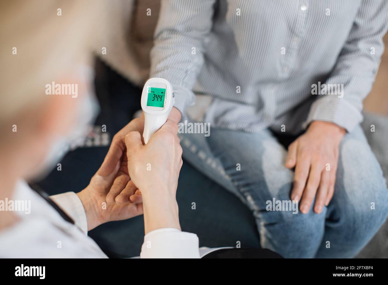 Close up cropped shot of unrecognizable female doctor checking body ...