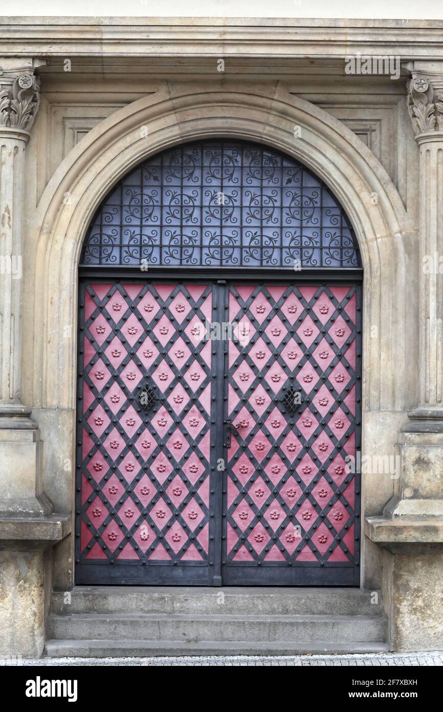 Old red door of a palace in Prague Stock Photo - Alamy