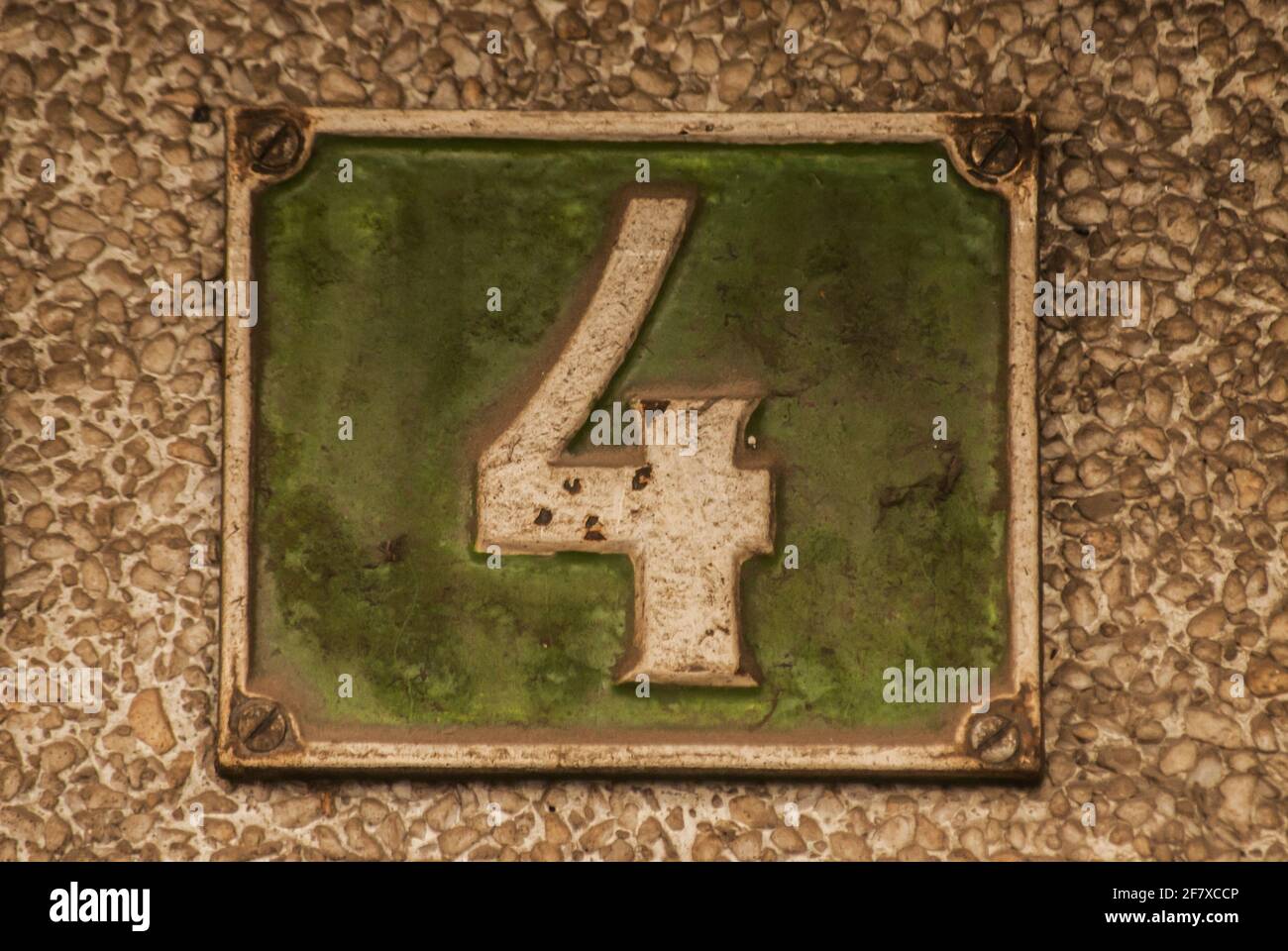 Old retro weathered cast iron plate with number 4 closeup Stock Photo ...