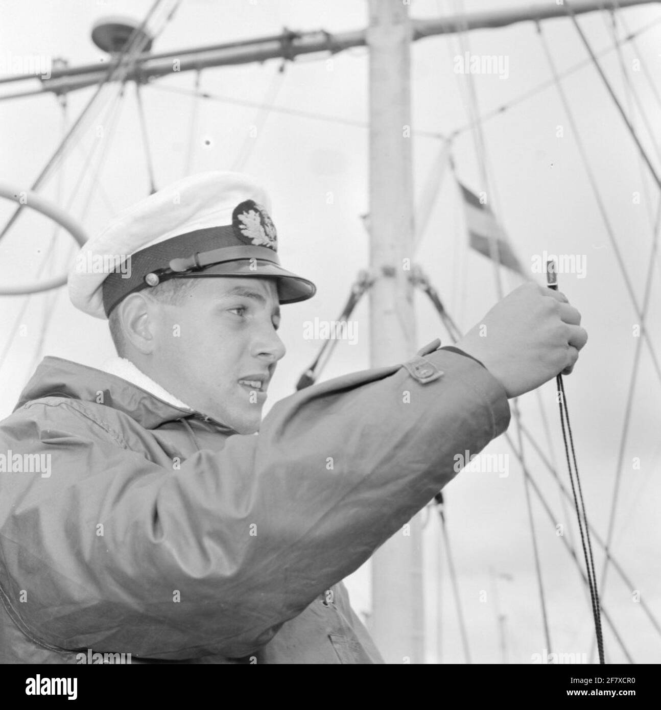 Officer aboard a mine sweeper with unknown sea-man instrument Stock ...