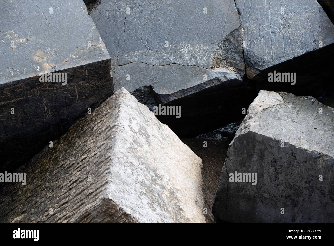 pile of breakwater stones on the coast Stock Photo - Alamy