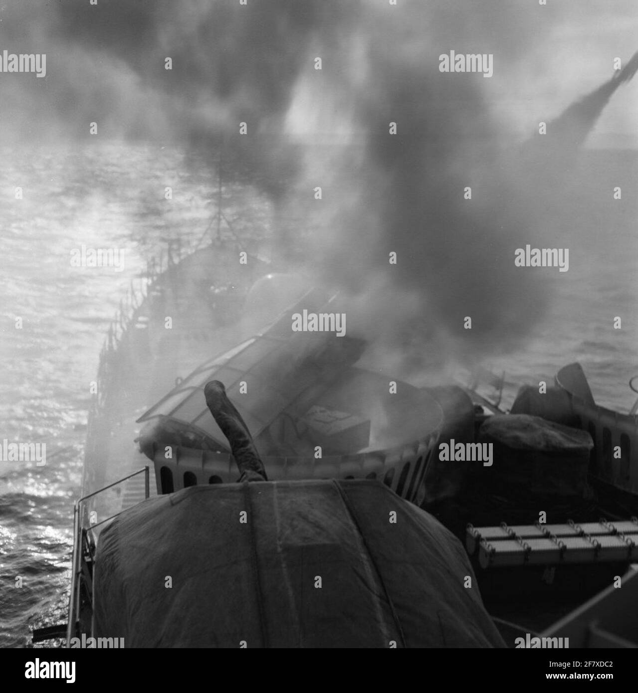 Firing a depth bomb rocket from the Submarine hunter Hr.Ms. Utrecht (D ...