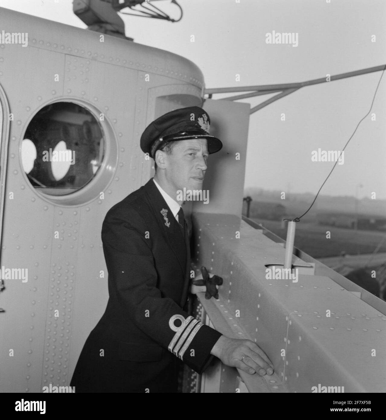 The commander of the submarine hunter Hr.Ms. Amsterdam (D 819) Captain ...