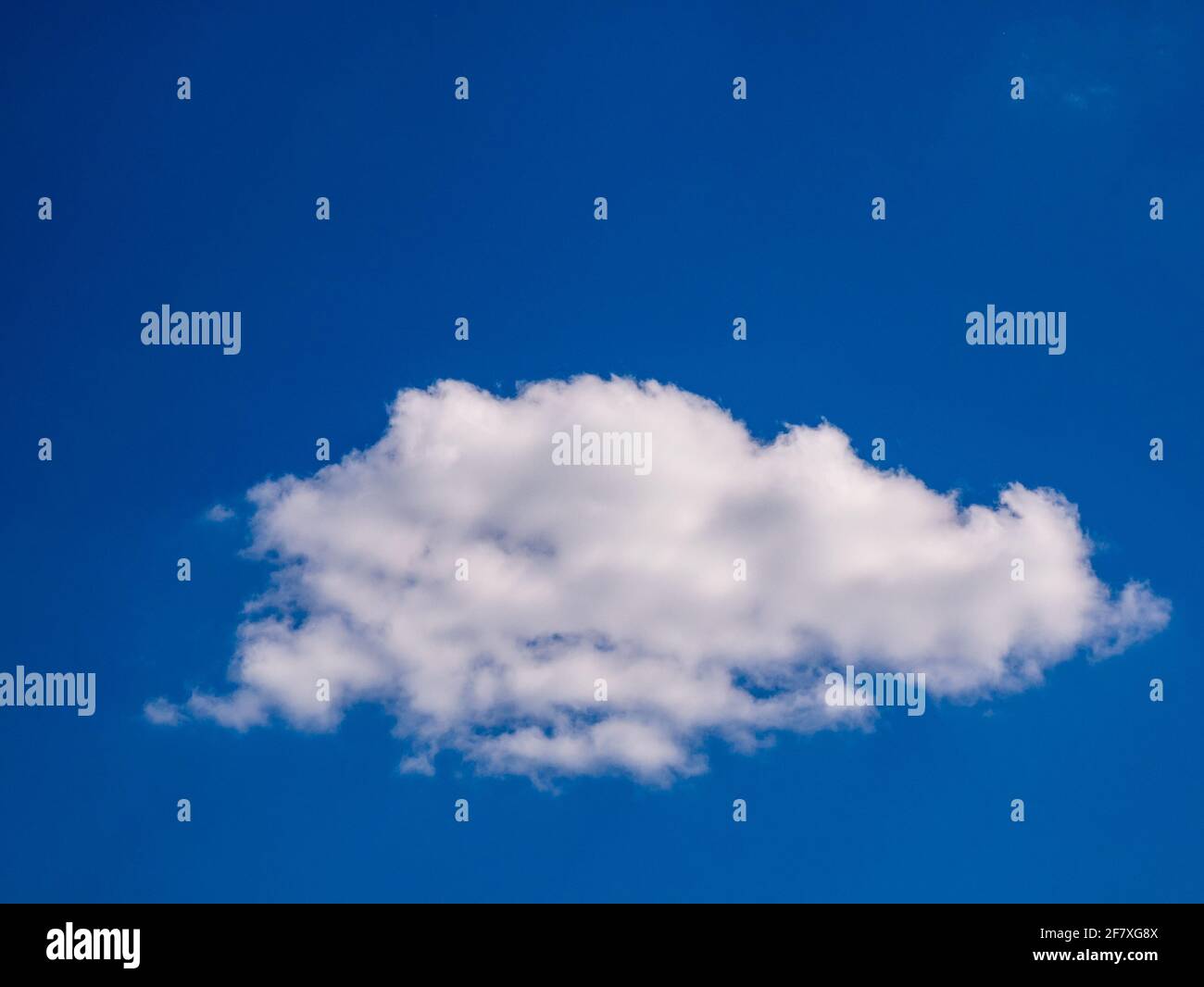 Cloudscape one white puffy cloud hi-res stock photography and images ...