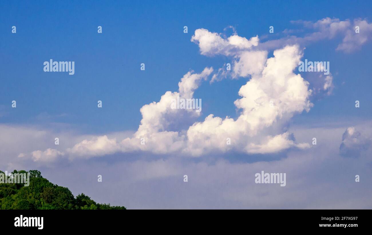 A high rain cloud in the distance (Cumulonimbus Stock Photo - Alamy