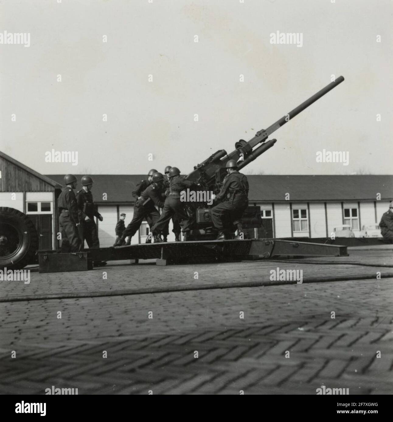 Battery exercise of heavy air target artillery with the 90 mm guns on ...