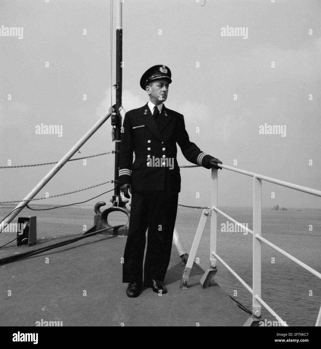 The commander of the submarine hunter Hr.Ms. Rotterdam (D 818) Captain ...