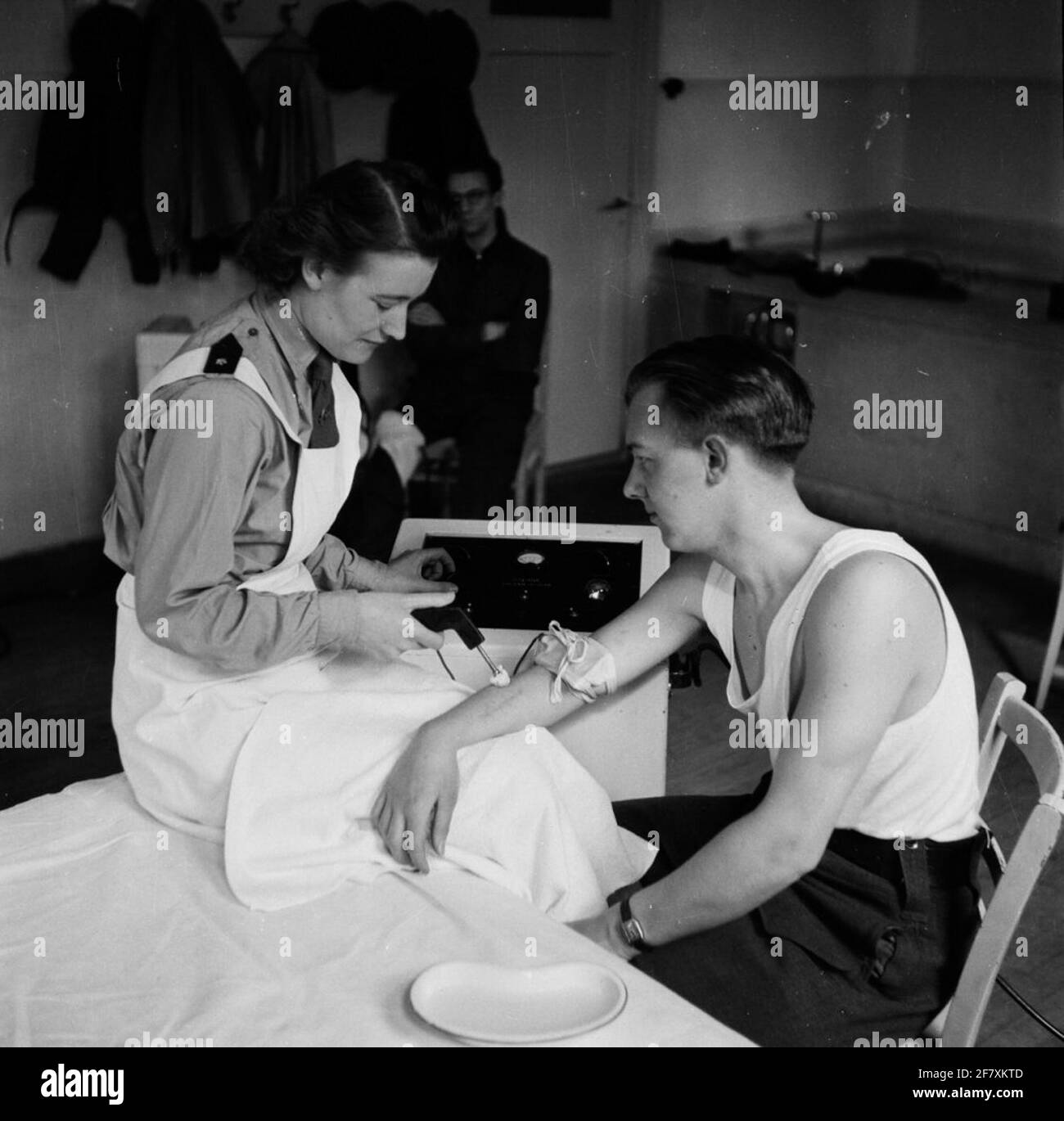A rehabilitation soldier receives therapy with modern electrical ...