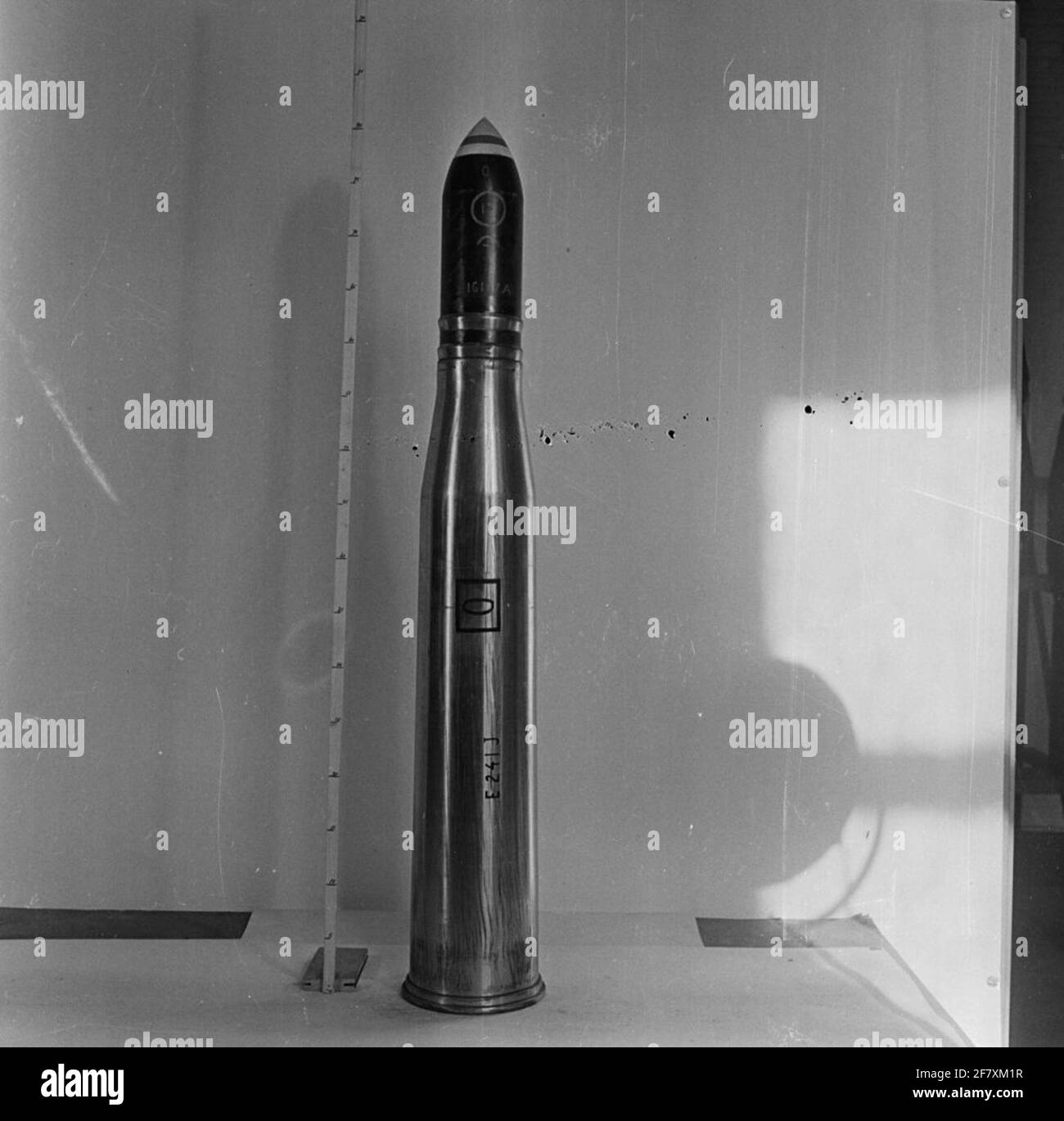 A complete 76.2 mm grenade (explosive and pushing load) with light ...