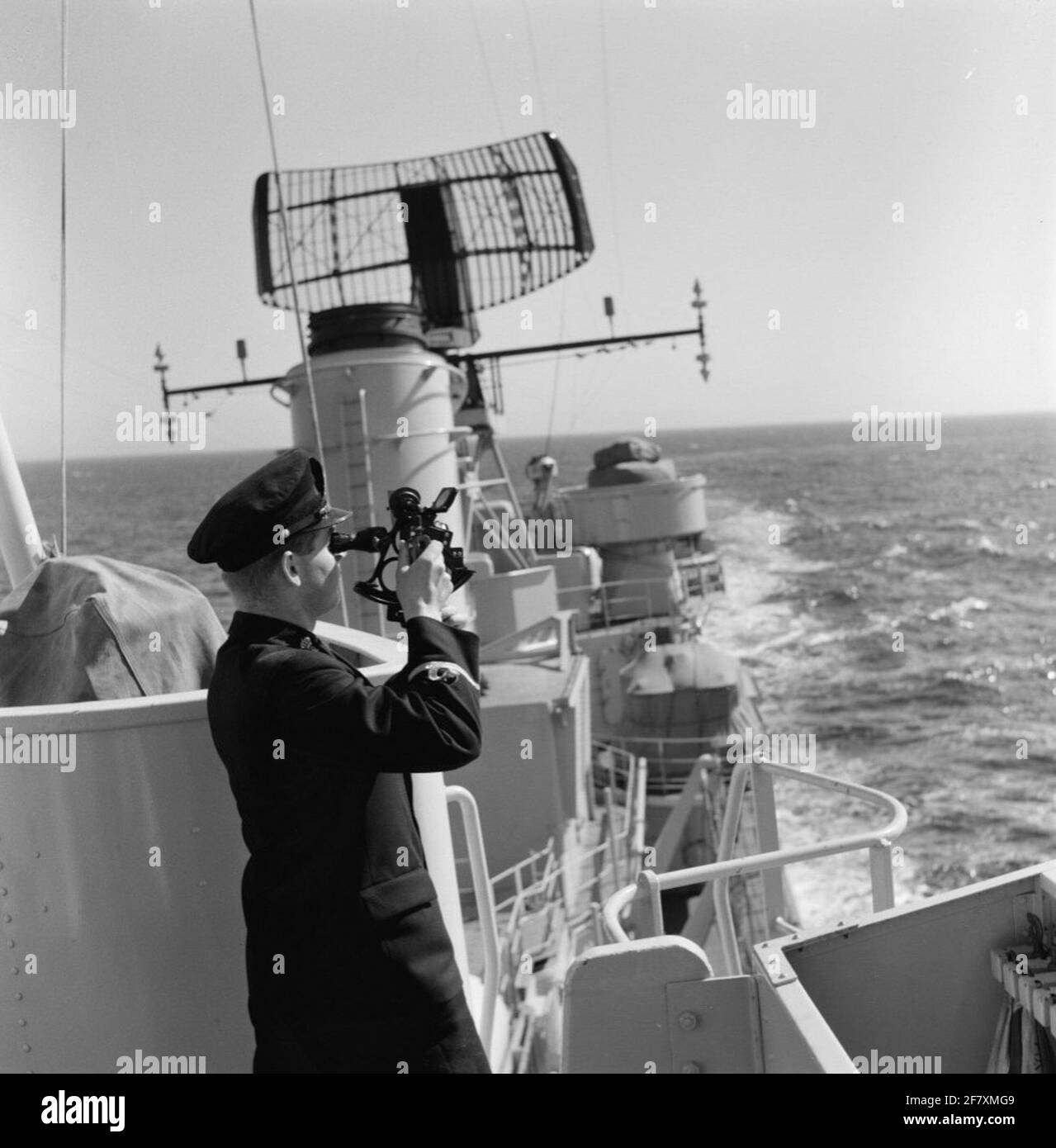 Sun shooting with a Sextant Subdue boat hunter Hr.Ms. Utrecht (D 817 ...