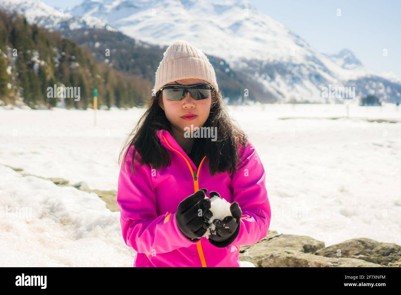 Chinese woman enjoying amazing snowy landscape view - happy and ...