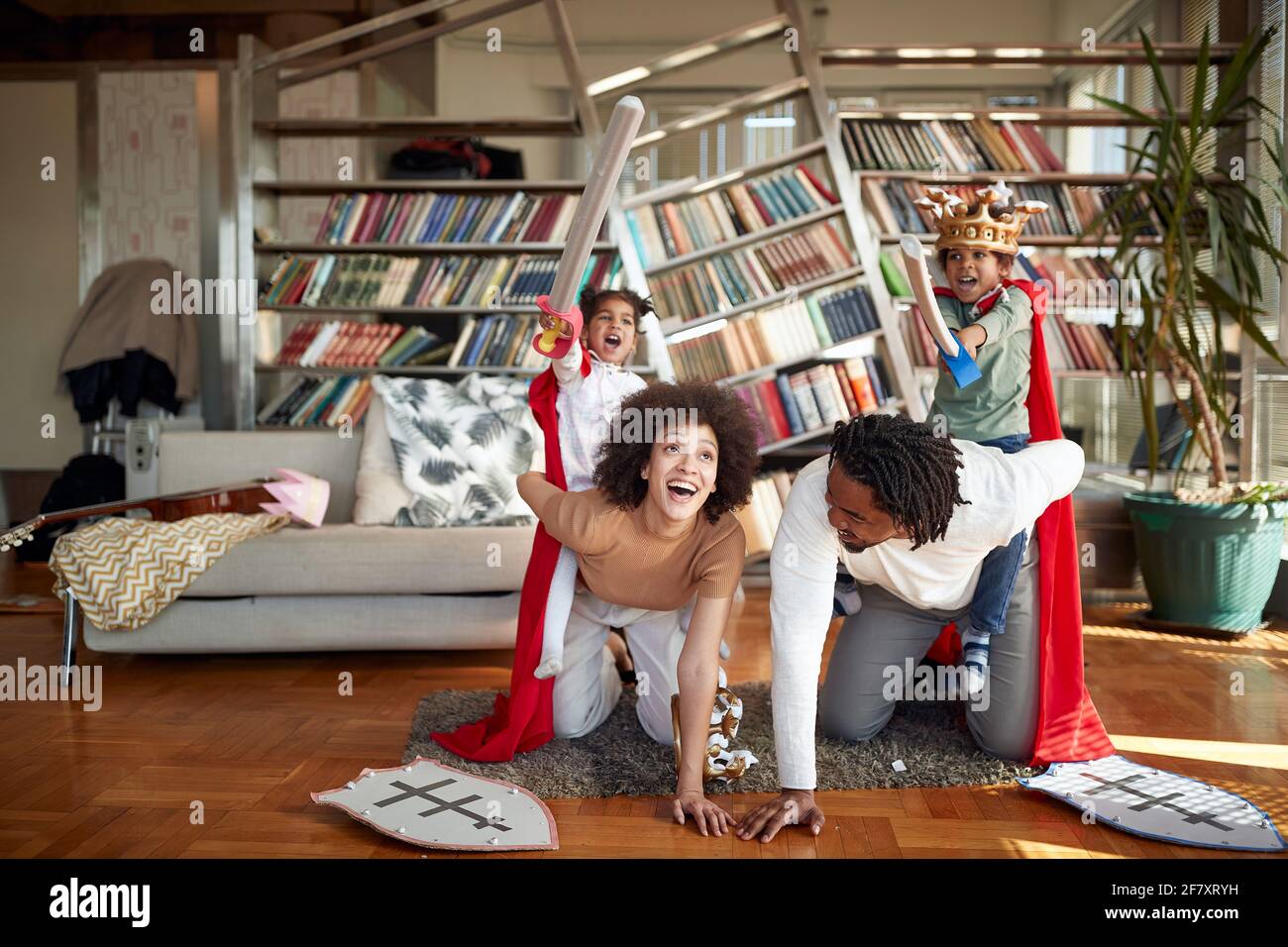 Family playing together hi-res stock photography and images - Alamy