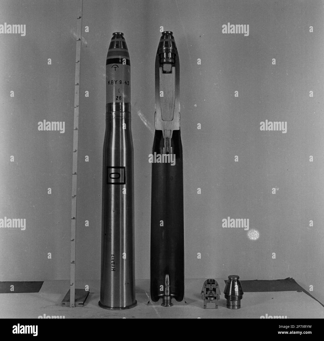 A complete 57 mm of grenade (explosive and pushing load) with a cross ...