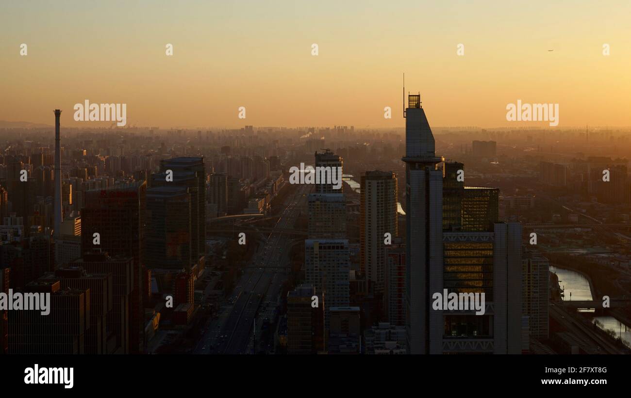 Sunrise in Beijing City with tall buildings Stock Photo - Alamy